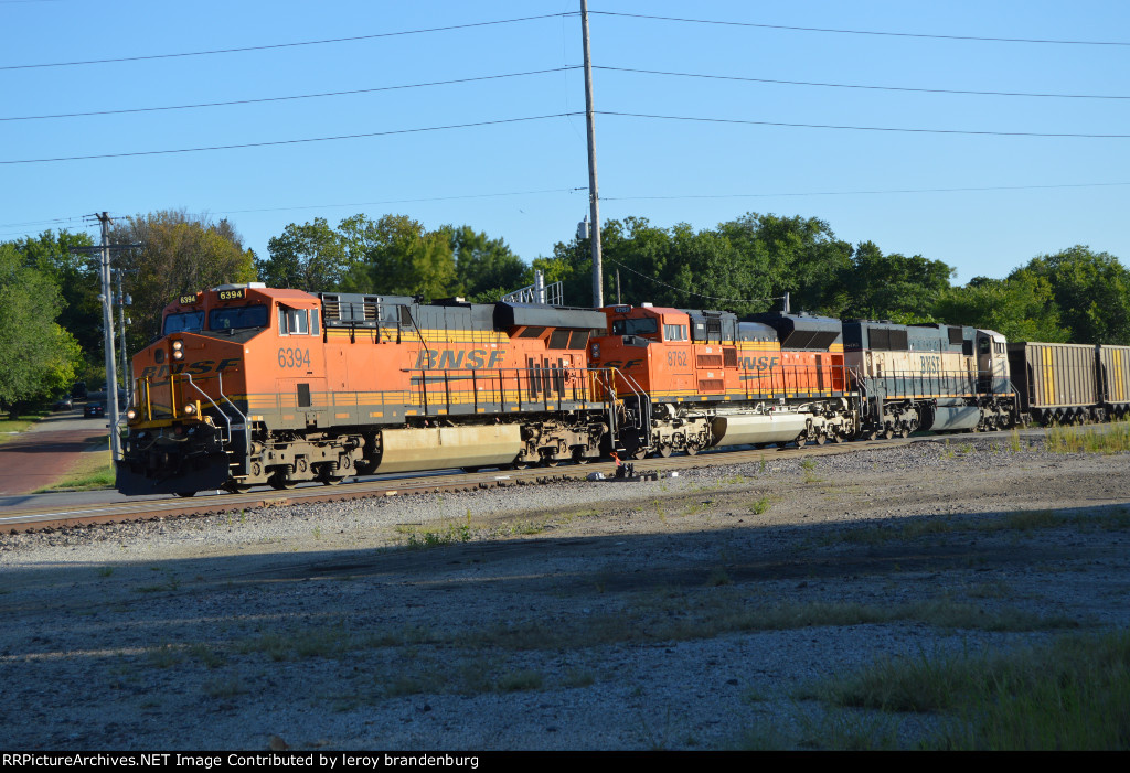 BNSF 6394 leads a NB empty coal